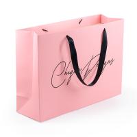 China Custom LOGO Cosmetics Gift CMYK Printable Paper Bags With Handle for sale