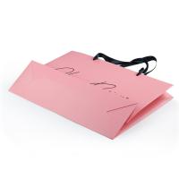 China Custom LOGO Cosmetics Gift CMYK Printable Paper Bags With Handle for sale