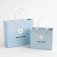 China 170g Cardboard Custom Shipping Bags for Clothes with Hot Stamping Logo for sale