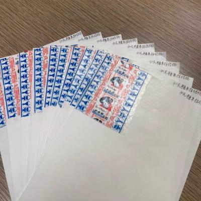 China Transparent Cellophane Candy Wrapping Paper 35g High Gloss Fruit Candy Display for sale