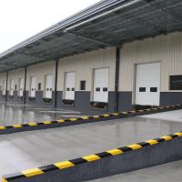 China Durable Industrial Sectional Overhead Door In Warehouses Loading Docks Distribution Centers for sale
