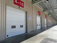 China Slide Running Industrial Sectional Door For Factories Logistics Warehouse Garages for sale
