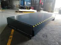 China Safety Electric Hydraulic Warehouse Dock Levelers 10 Ton 2 Piece Bumper Block Protection for sale