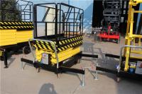 China Yellow Mobile Scissor Lift Table Battery Operated Scissor Lift Lifting Max Height 16m for sale