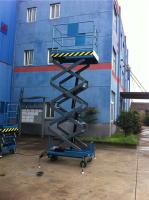 China One Man Can Easy Pull Or Tow Aerial Working Table Mobile Scissor Hydraulic Lift Platform Movement for sale