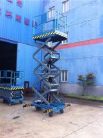 China Solid Tyre Wheel Skidproof Checkered Platform Aerial Hydraulic Mobile Scissor Lift for sale