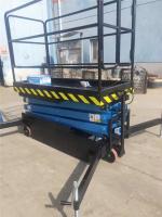 China One Man Can Easy Pull Or Tow Aerial Working Table Mobile Scissor Hydraulic Lift Platform Movement for sale