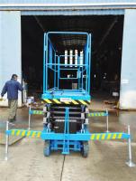 China One Man Pull Walking For Hotel Aerial Maintence Mobile Hydraulic Scissor Working Platform for sale