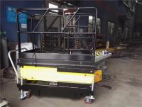 China Manual Pull Handle Mobile Boom Lift Hydraulic Scissor Lifter With Full Handrail for sale