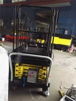 China Manual Pull Handle Mobile Boom Lift Hydraulic Scissor Lifter With Full Handrail for sale