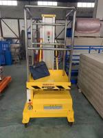 China Mast Type Hydraulic Aerial Work Platform Mobile Boom Lift Yellow Easy Move for sale