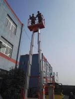 China Electric Hydraulic Boom Supported Elevating Work Platforms Vertical Mast Lift Orange for sale
