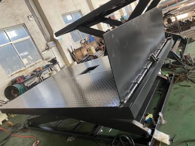 China 1500kg Load Capacity Hydraulic Scissor Dock Lift Platform With Electric Lip Easy For Pallet Truck Loading for sale