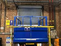 China Hydraulic Electric Scissor Lifting Structure With Checkered Sheet For Wharehouse Loading And Unloading for sale