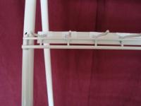 China 12 Tier Hooks Zipper Metal Floor Display Stands Single Side Tubular Frame for sale