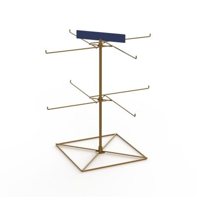 China Trinket Wire Hooks Rotating OEM Metal Table Top Display Stands for sale