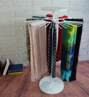 China Multiple Hooks Spinner Metal Clothing Display Rack For Toggery for sale
