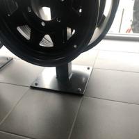 China 8 Wheels Black 2 Sides Hooks Metal Display Rack For Wheel Hubs for sale
