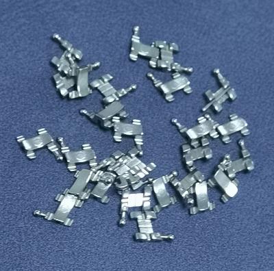 China Tolerance 0.03mm MIM Metal Injection Molding Iron Dental Orthodontic Brackets for sale