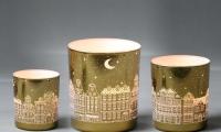 China Custom Gold Christmas Village Glass Candle Cup Traditional Motif For Festive Home Decor for sale