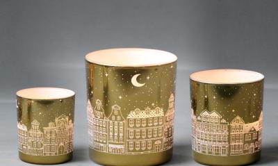 China Custom Gold Christmas Village Glass Candle Cup Traditional Motif For Festive Home Decor for sale