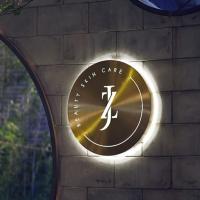 China Metal Stainless Steel Round Led Light Box Custom Logo 3d Illuminated for sale