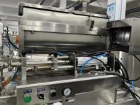 China Heat Seal Liquid Packaging Machine With Small Liquid Pump 100-1000ml for sale