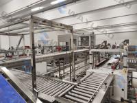 China Automatic Bread Packaging Line PLC Control 35-150 Bags/Min Capacity for sale
