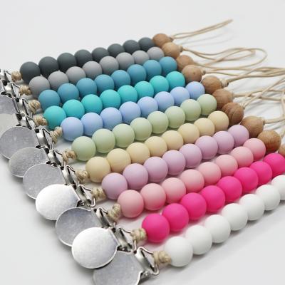 China New Baby Products Custom Logo Pacifier Holder Baby Pacifier Clip Wholesale 100%food grade BPA silicone teether free for sale