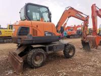 China Second Hand DX60W 6T 0.175m3 Doosan Wheeled Excavator for sale