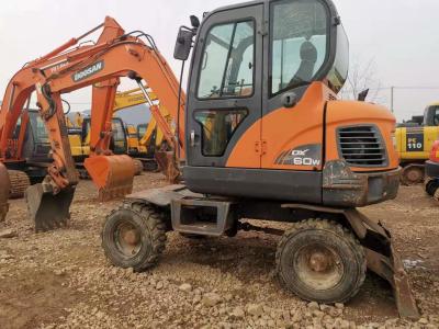 China Second Hand DX60W 6T 0.175m3 Doosan Wheeled Excavator for sale