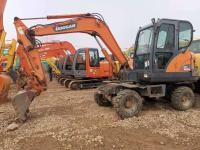 China Second Hand DX60W 6T 0.175m3 Doosan Wheeled Excavator for sale