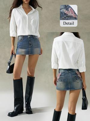 China Blue Low Waist Embroidered Denim Skirts Custom (4006) for sale