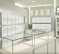 China Minimalist Microcement Cream Style LED Durable High End Custom Curved Jewelry Display Cases Stainless Steel Legs for Retail for sale