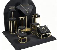 China Luxury Black Velvet Gold Metal Jewelry Display Stand Set Complete Turnkey Package LED Lit Eco-Friendly Multi-Height Stands for sale