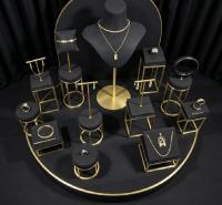 China Luxury Black Velvet Gold Metal Jewelry Display Stand Set Complete Turnkey Package LED Lit Eco-Friendly Multi-Height Stands for sale