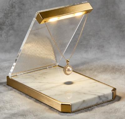 China Custom Luxury Suspended Jewelry Display Case, Premium Gold Frame Acrylic Showcase with LED Light for sale