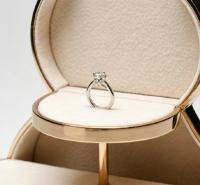 China Custom Luxury Rotating Jewelry Display Case, Premium Gold Frame Velvet Display Stand for Engagement Ring for sale