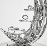 China Luxury Moon-Shaped Rotating Ring Display Stand 360 Rotatable Silver Metal Jewelry Organizer LED Lighting Durable High-End for sale