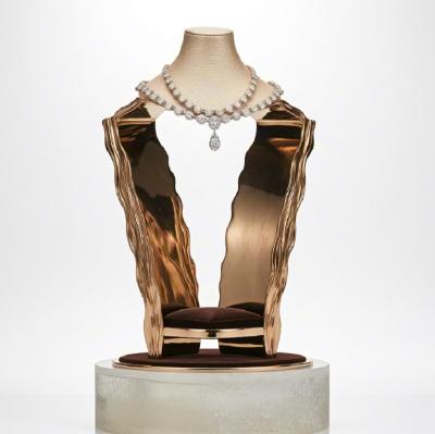 China Luxury Artistic Wavy Rose Gold Handcrafted Metal Necklace Jewelry Display Stand LED Lighting Customized Finish for High-End for sale
