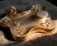 China Jewelry Display Stand with Custom Gold Plated Metal Tray and Velvet Insert for Luxury Jewelry Retail for sale