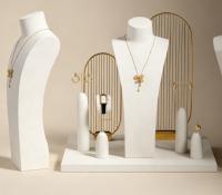 China Elegant Modern High Quality Jewelry Display Set with LED Lighting White Velvet & Gold Metal Stand for Jewelry Retail for sale