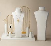 China Elegant Modern High Quality Jewelry Display Set with LED Lighting White Velvet & Gold Metal Stand for Jewelry Retail for sale