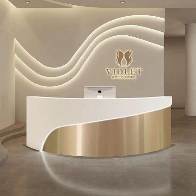 China Luxury Wooden Cashier Counter with Gold Metal Frame for High-End Jewelry Store for sale