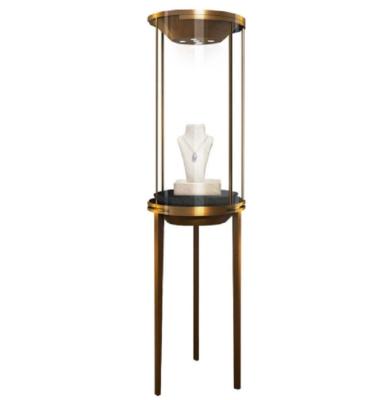 China Modern Luxury Brass Cylinder Jewelry Display Pedestal Freestanding Glass Showcase LED Lighting Eco-Friendly for Statement for sale