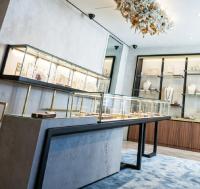 China Industrial Chic Concrete Walnut Wood LED Eco-Friendly Jewelry Store Interior Design Complete Turnkey Fixture Package Minimalist for sale