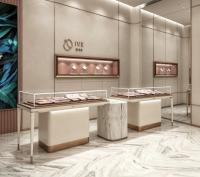 China Luxury Ivory White & Rose Gold Jewelry Store Interior Design, Complete Turnkey Fixture Package with Linear Showcase Counters for sale