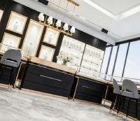 China Custom Luxury Jewelry Shop Solution, Sleek Black & Gold Showcase with Integrated LED Lighting & Chandelier for sale