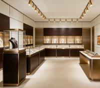 China Luxury Dark Brown Leather Gold Mall Jewelry Store Display Set Complete Turnkey Fixture Package Pedestals Counters Wall Niches for sale