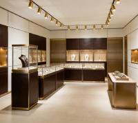 China Luxury Dark Brown Leather Gold Mall Jewelry Store Display Set Complete Turnkey Fixture Package Pedestals Counters Wall Niches for sale